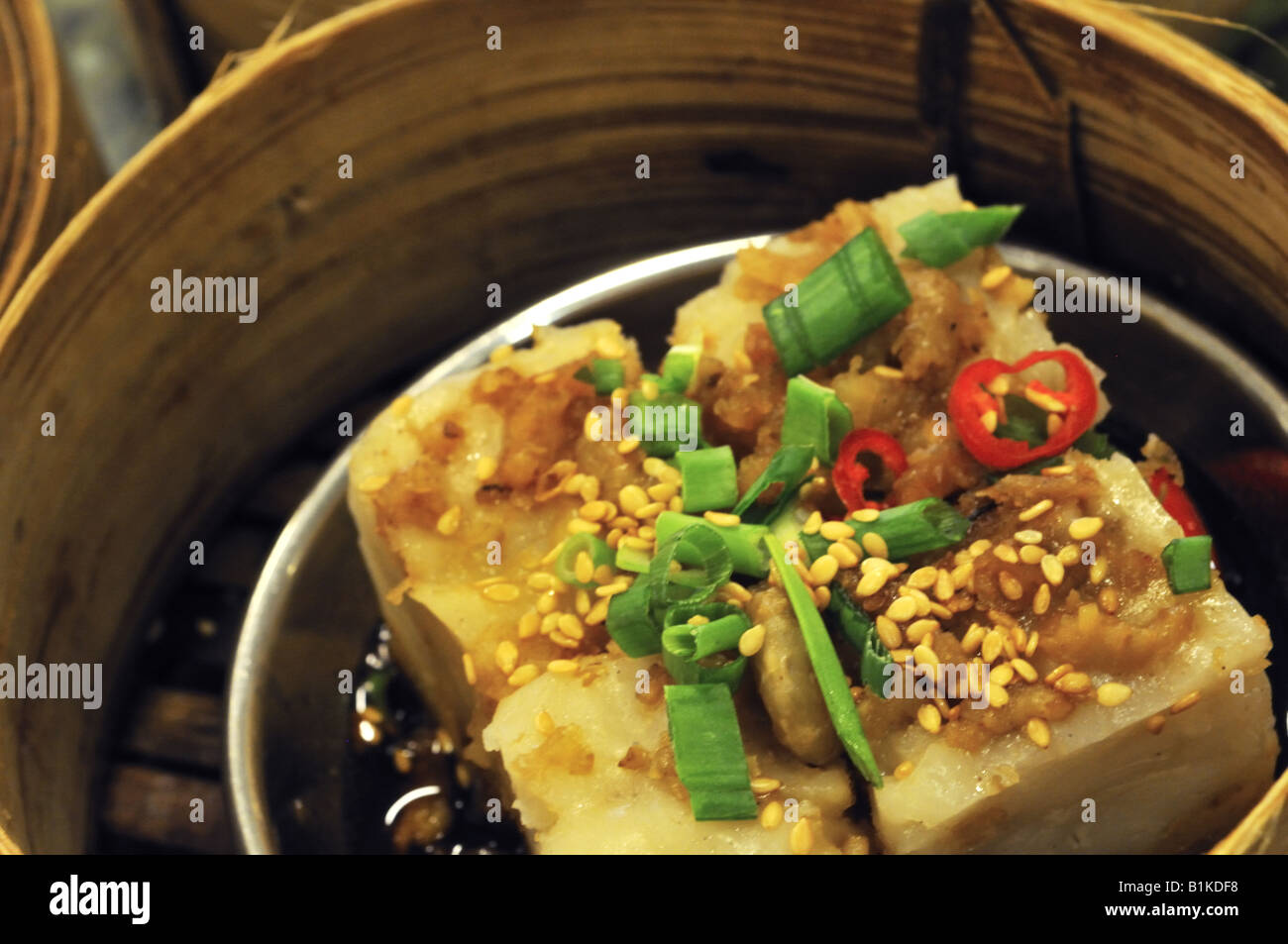 Singapore style dim sum dish served in steamer basket Stock Photo - Alamy