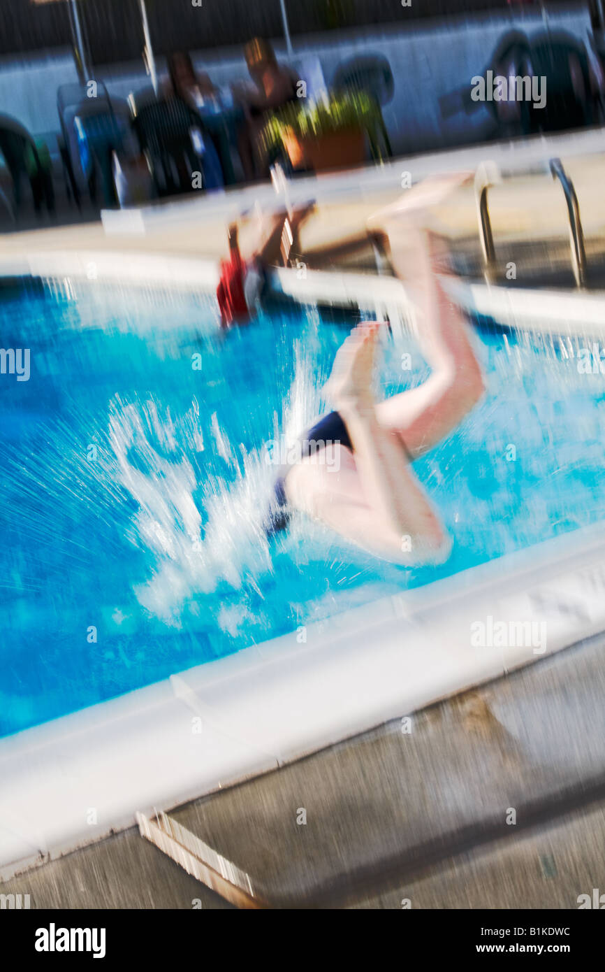 girl diving into swimming pool Stock Photo - Alamy