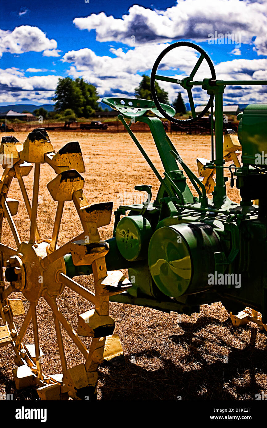 Image of a steel wheel cleet tractor sitting in a field Stock Photo - Alamy
