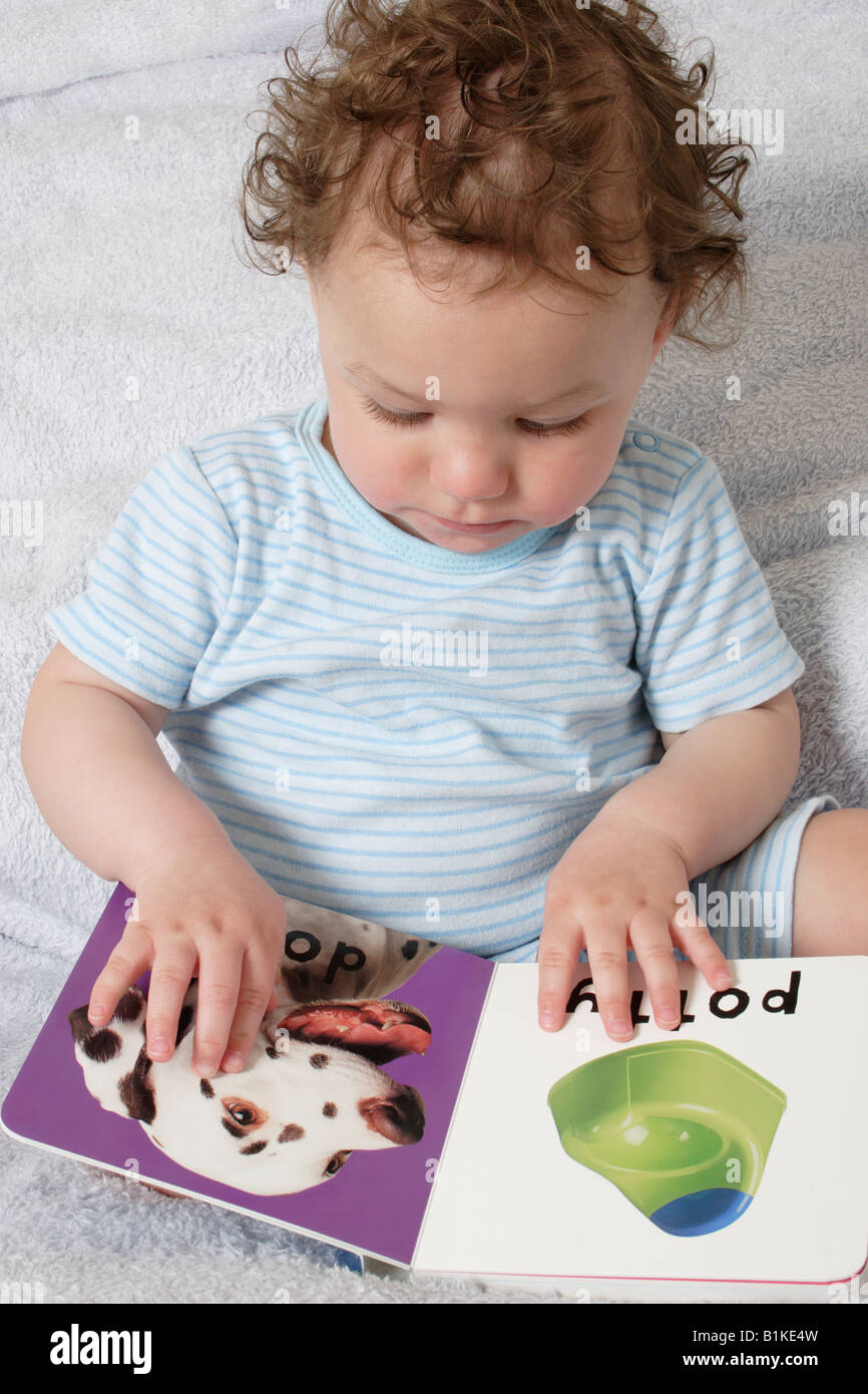 little baby reading book Stock Photo - Alamy