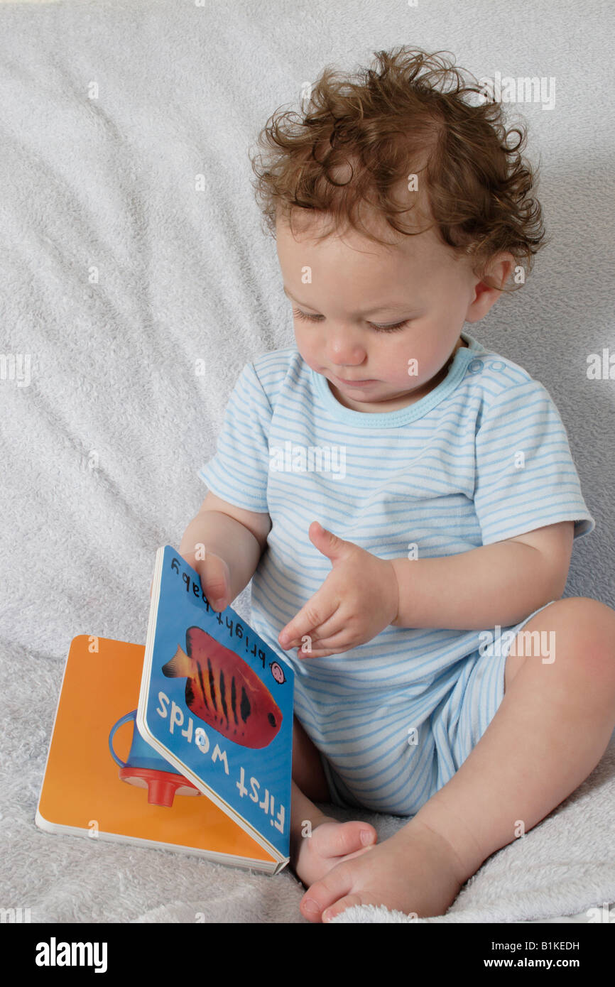 little baby reading book Stock Photo - Alamy