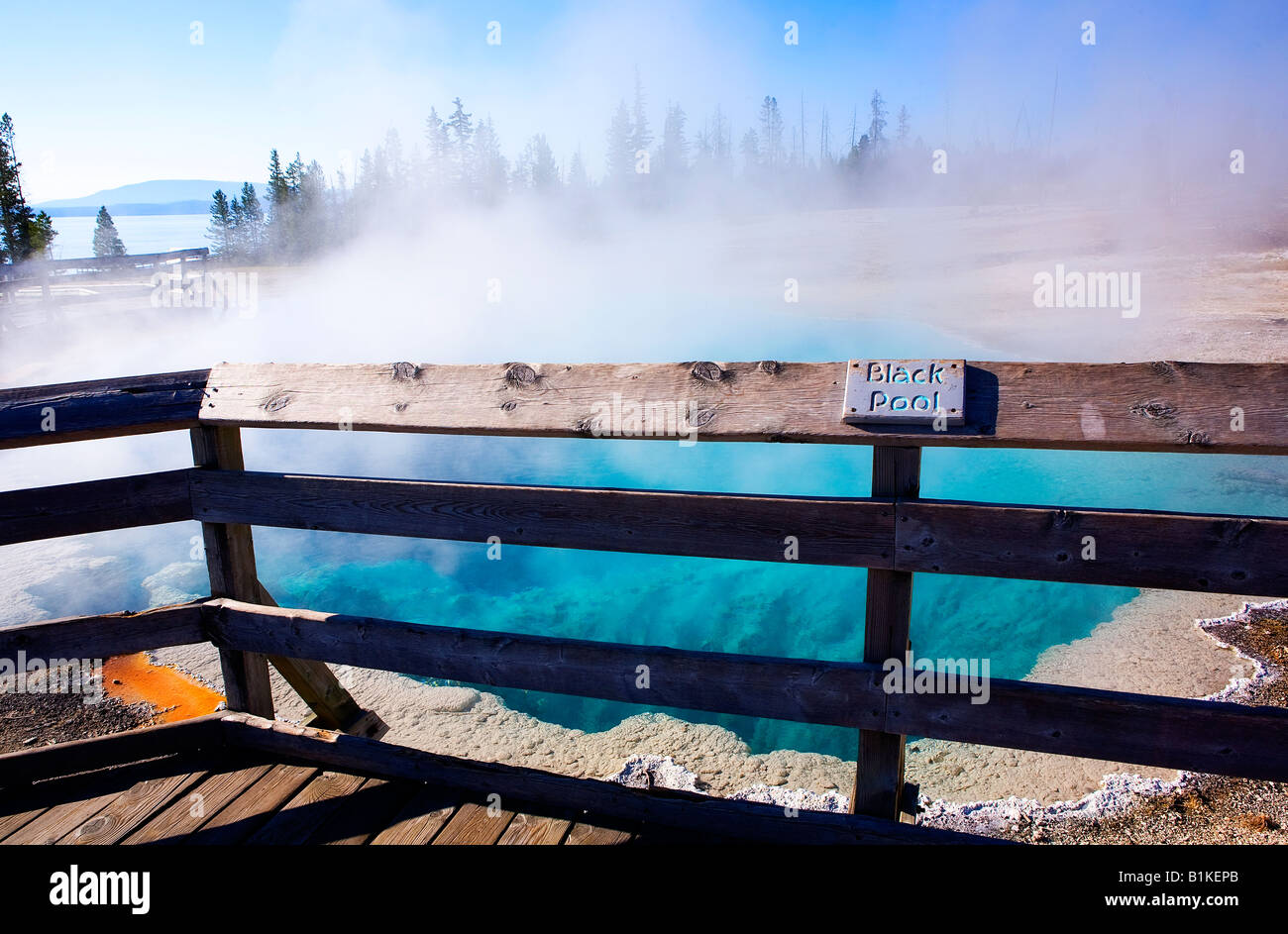 Image looking out through and over the railing and sign of the viewing ...