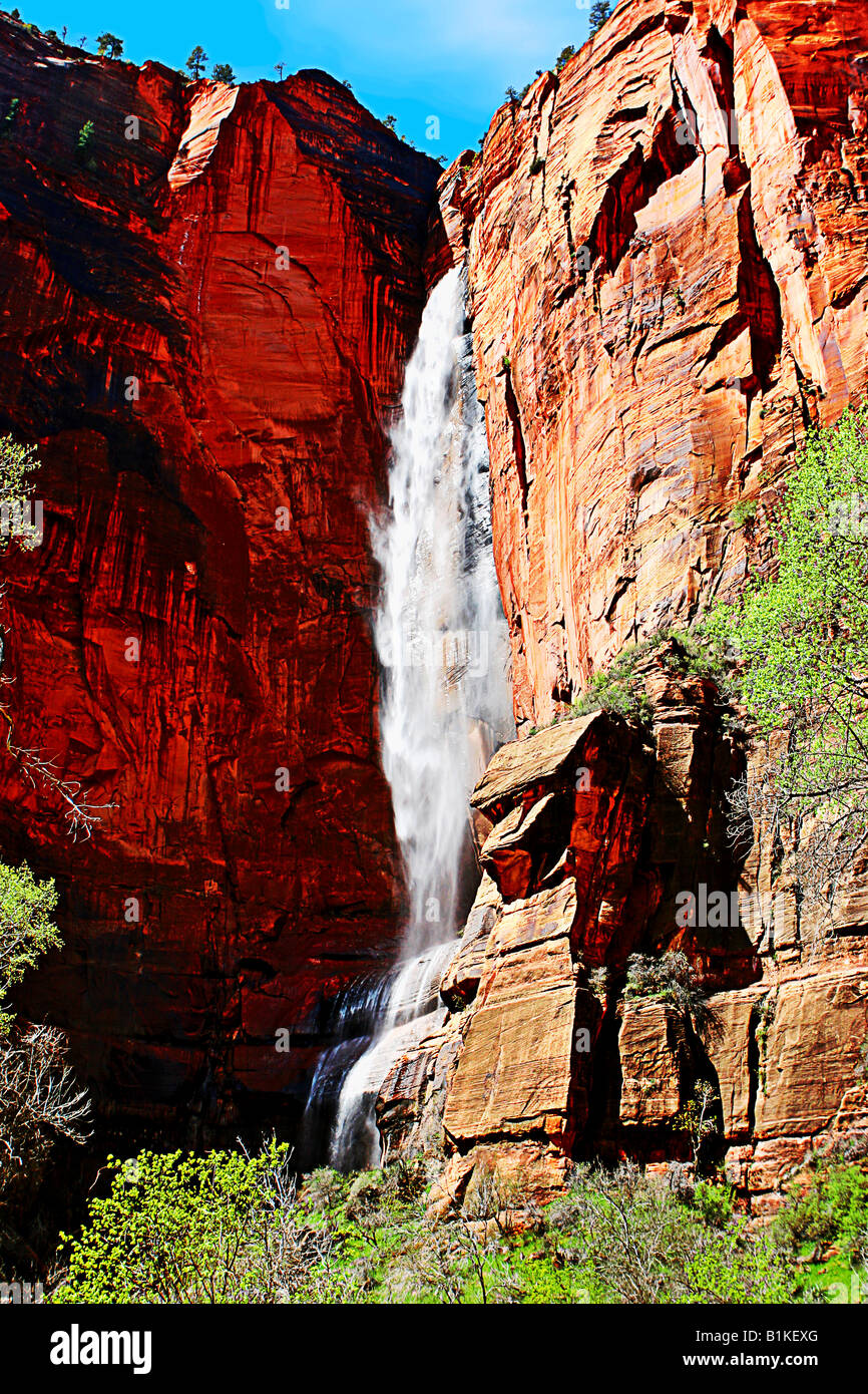 Image looking up at Weeping Rock as a freak spring waterfall gushes ...