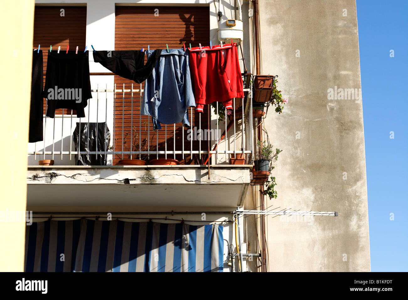 Washing hanging from a balcony hi-res stock photography and images - Alamy