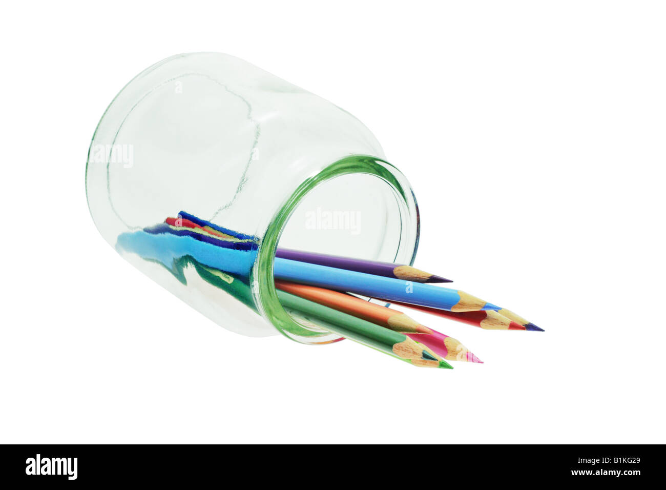 Color pencils in glass container on white background Stock Photo - Alamy