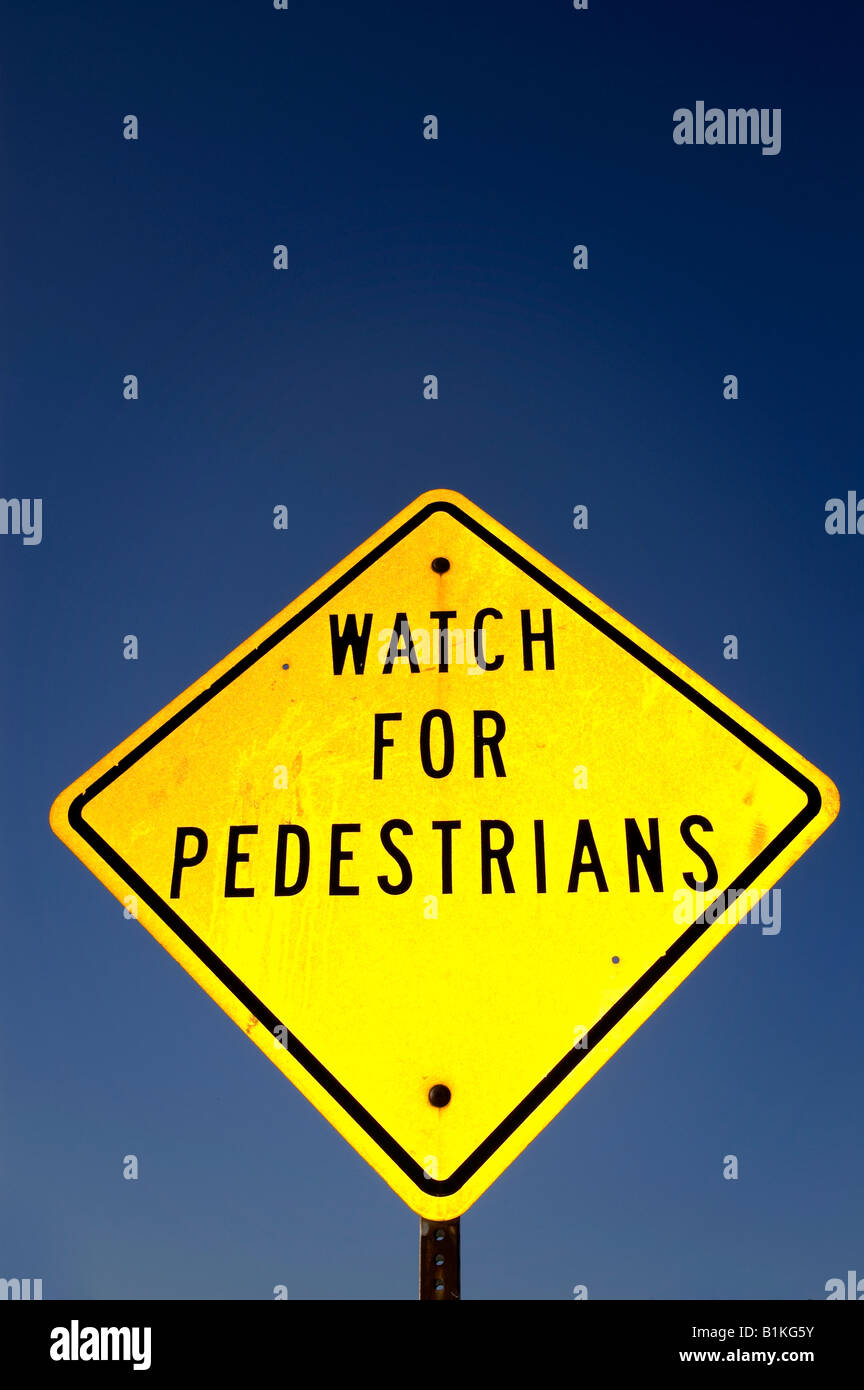 "Watch for pedestrians" road sign Stock Photo - Alamy