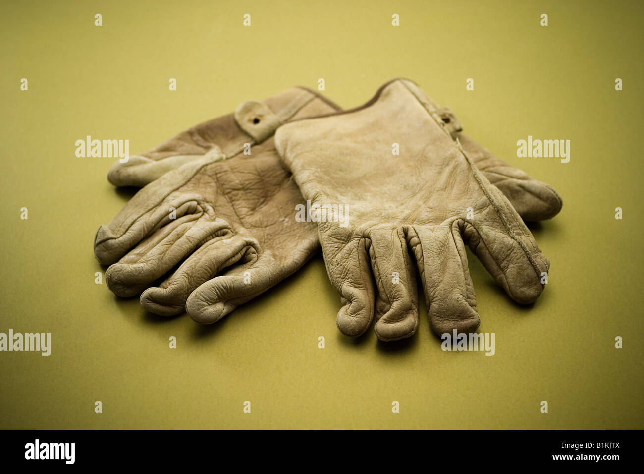 Old work gloves horizontal Stock Photo - Alamy
