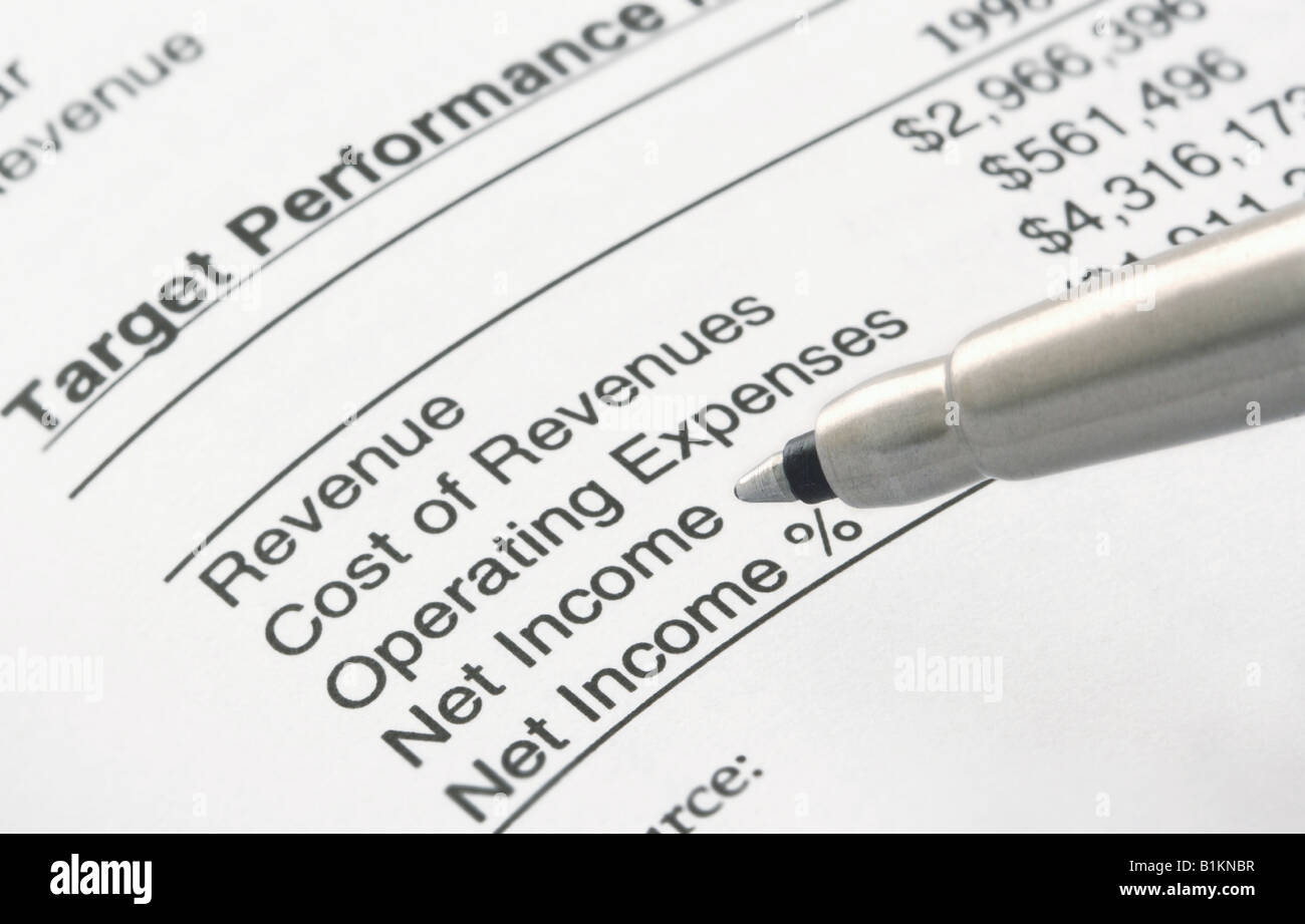 A pen is pointing at the word Income Stock Photo - Alamy