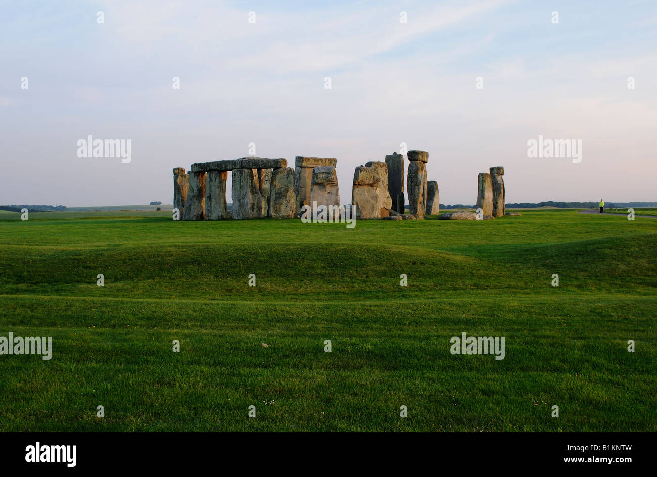 Stonehenge with security guard, Wiltshire, England, UK Stock Photo - Alamy