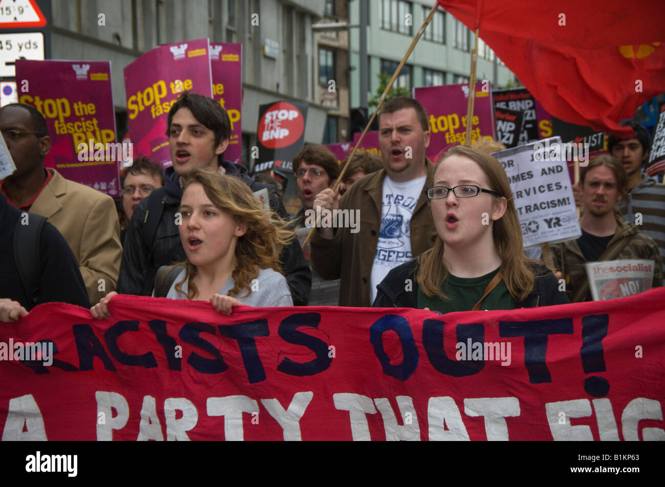 People behind the International Socialist Resistance banner at 'Stop ...