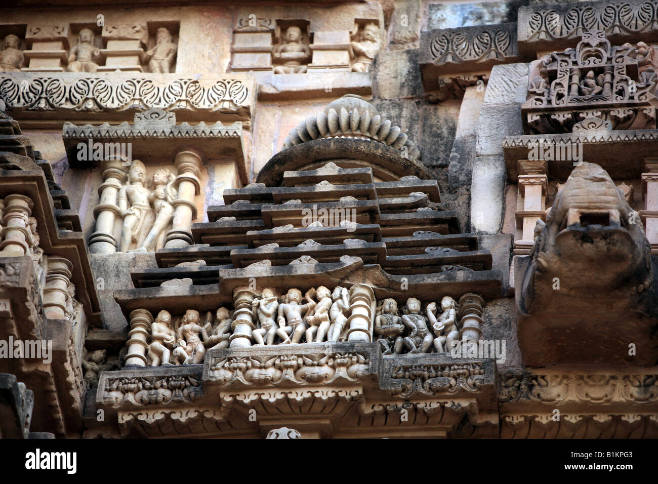 Detail of the stone carvings on the walls of the Kandariya Mahadeo ...