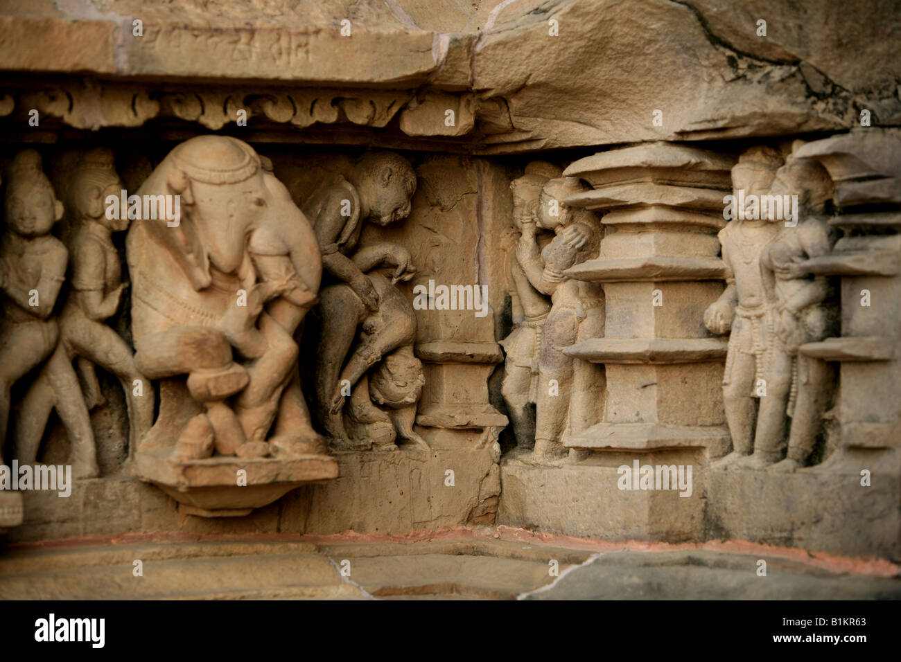 Detail of the stone carvings on the walls of the Kandariya Mahadeo ...