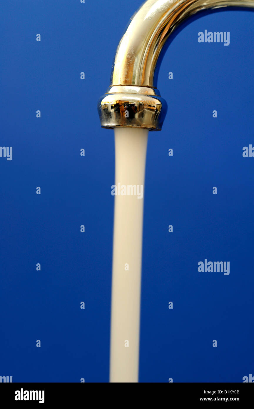 Water flowing from water faucet Stock Photo - Alamy