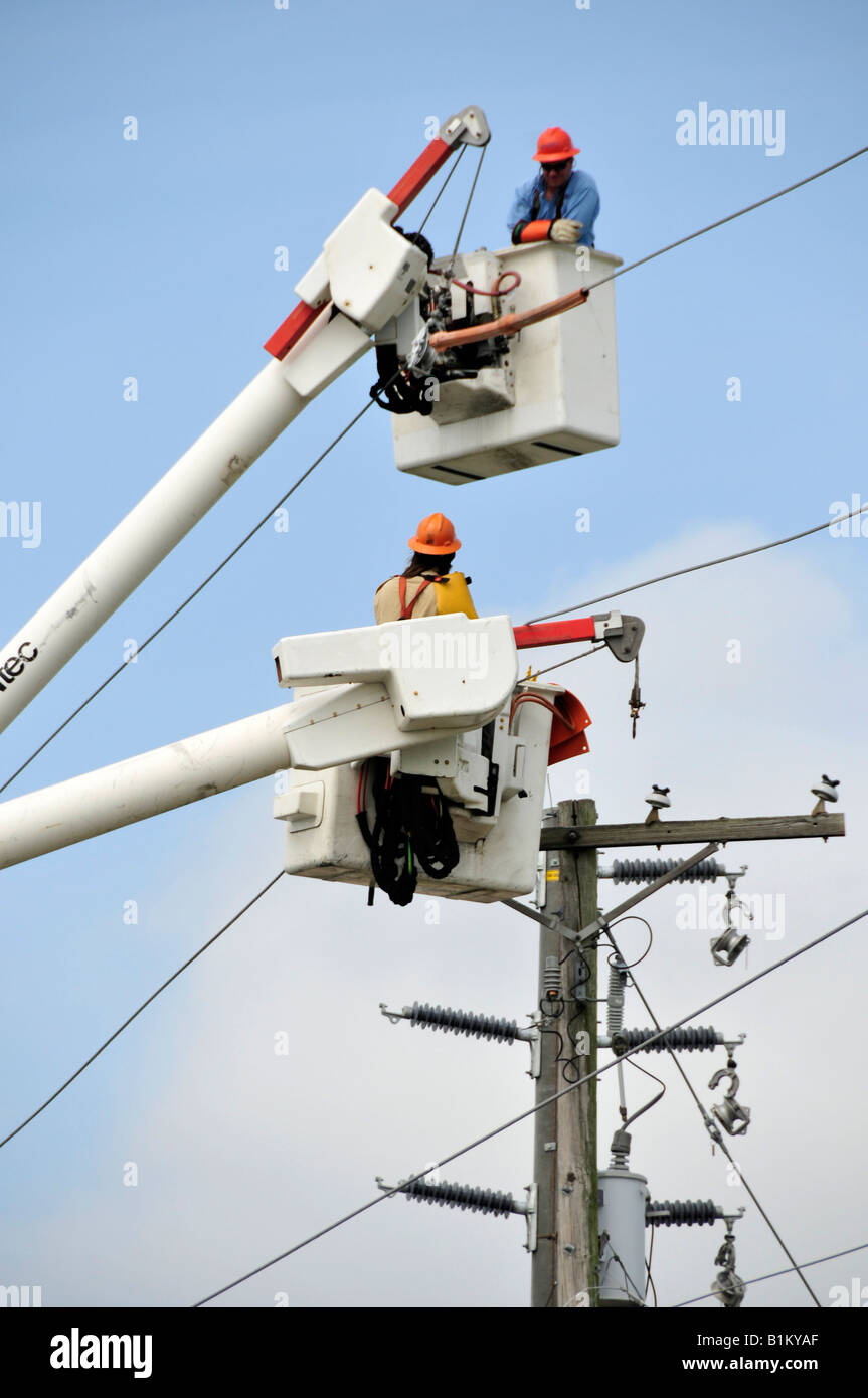 Workers install high tension electrical power lines Lakeland Florida ...
