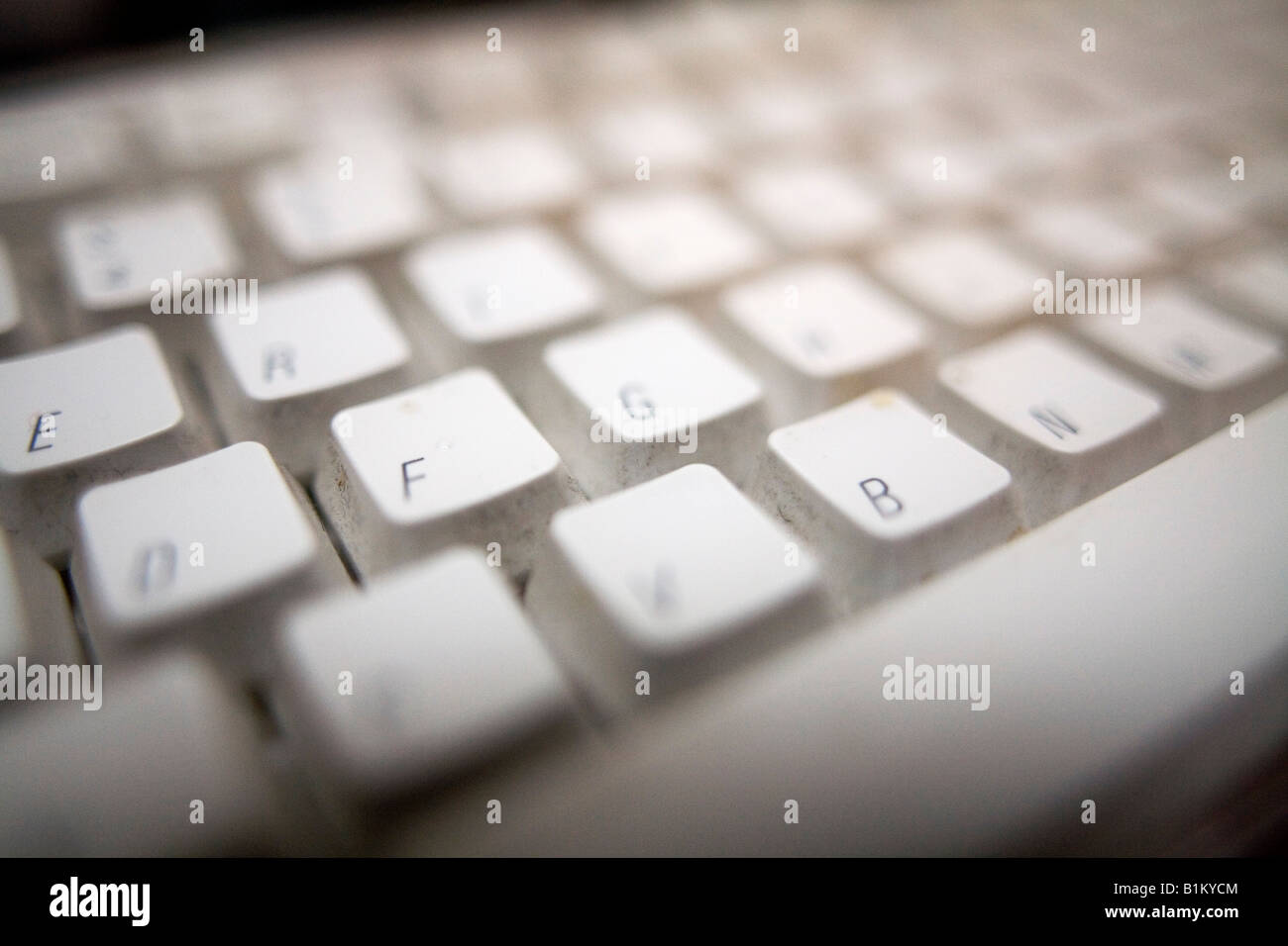 Dirty computer keyboard letters E, F and B Stock Photo - Alamy