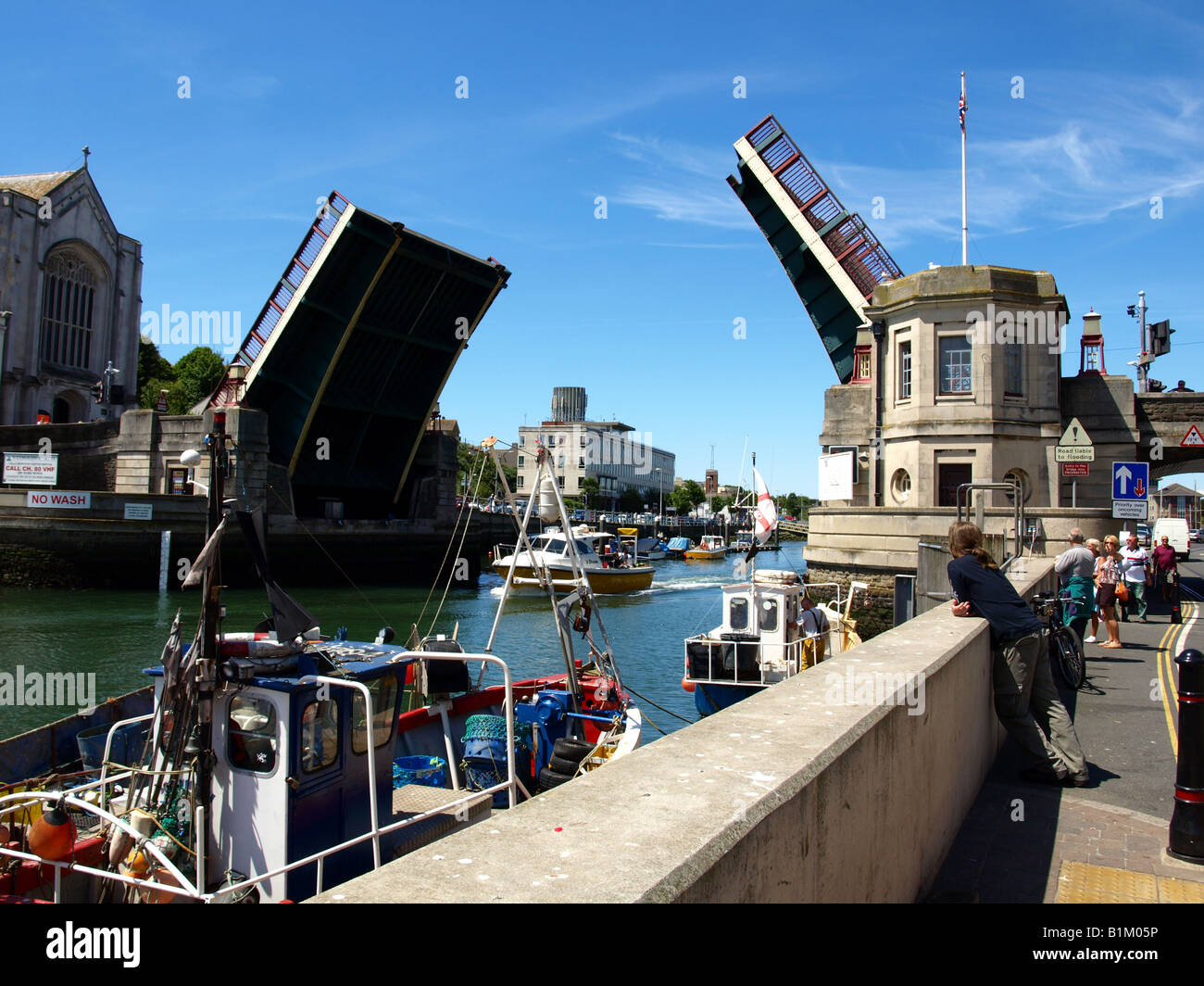 the road bridge open for boats from the harbour to the sea at Weymouth ...