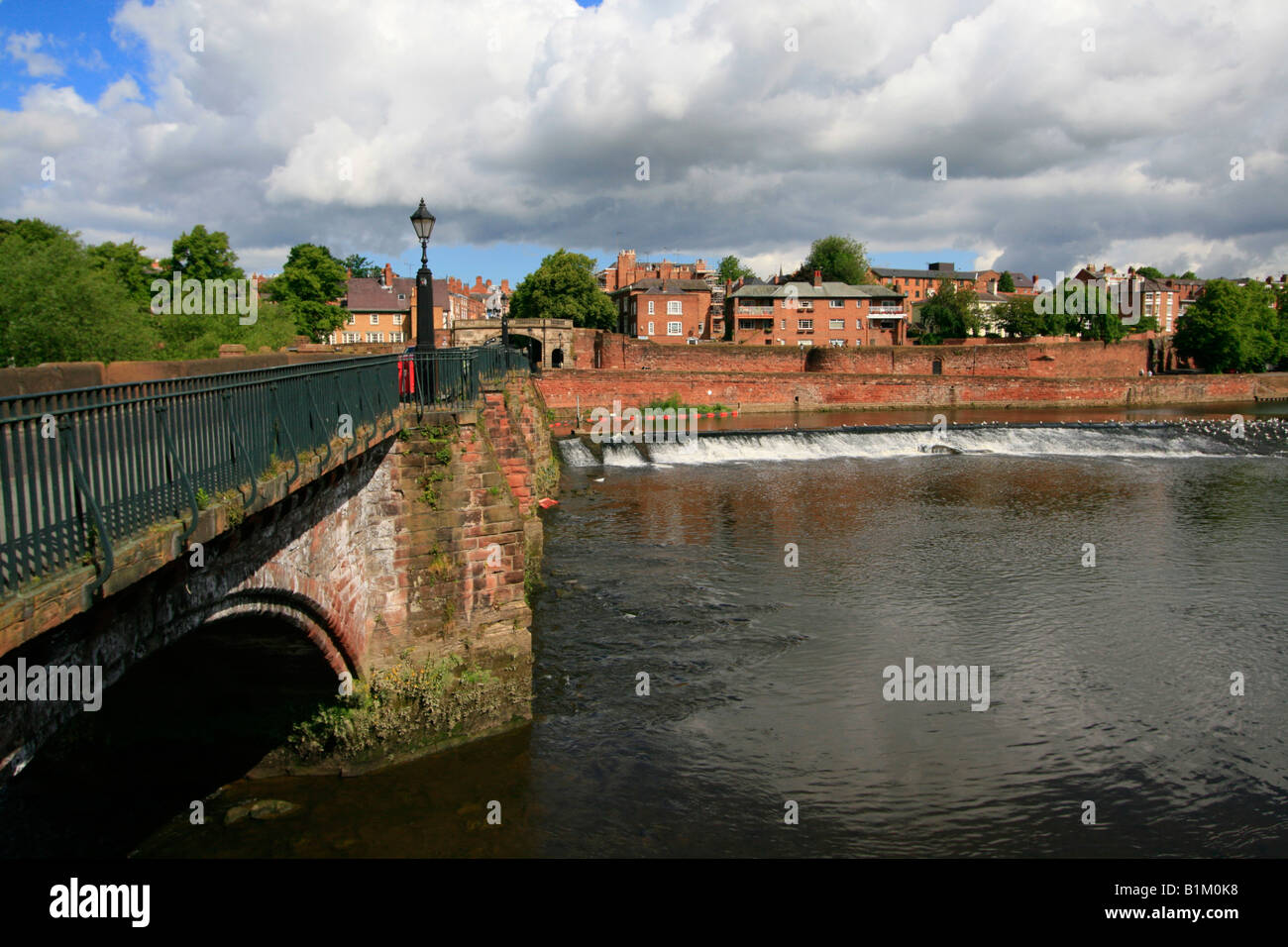 the Old Dee Bridge summer time by River dee flowing through the city of ...