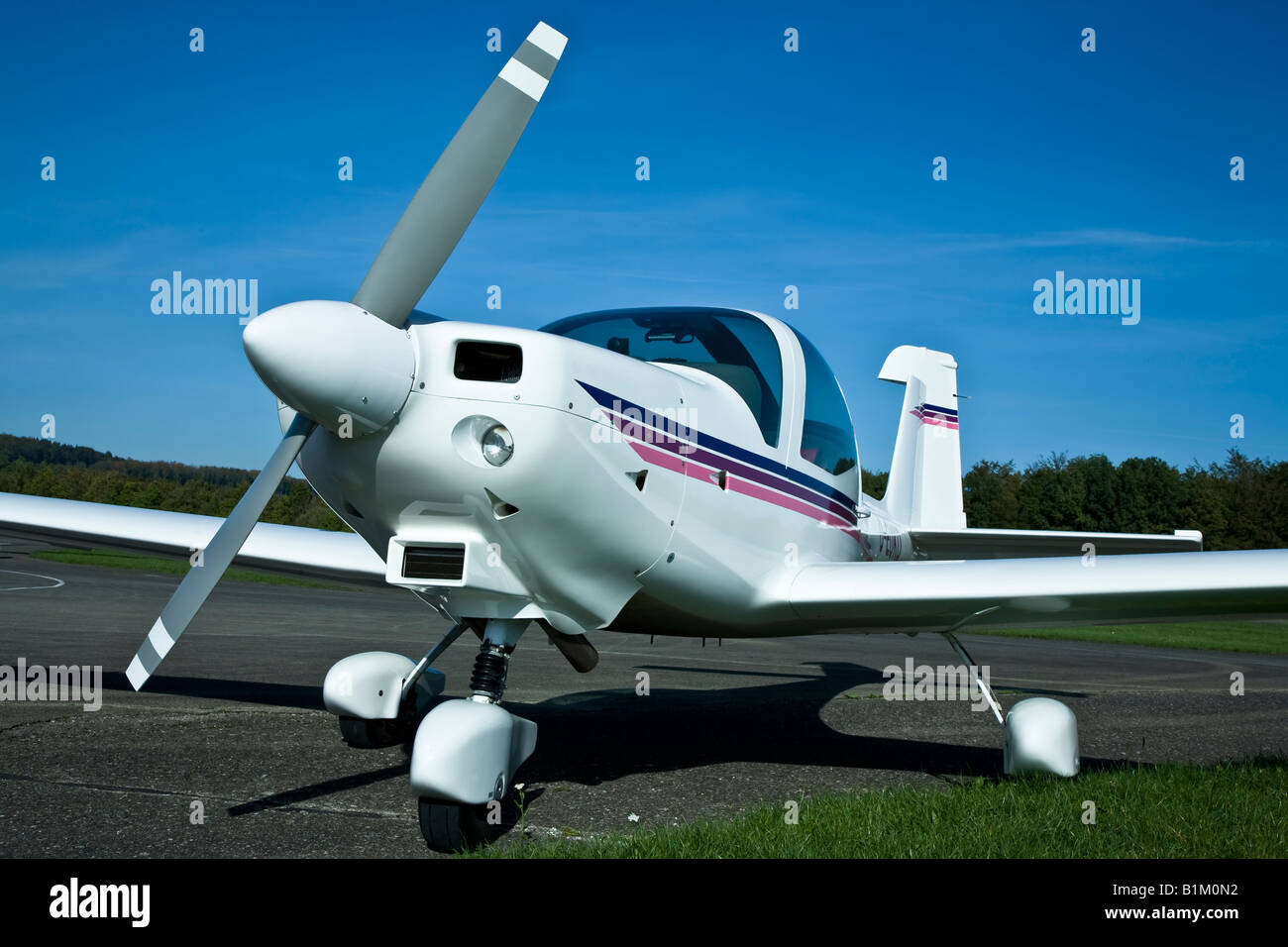 Small propeller airplane at the airfield Stock Photo - Alamy