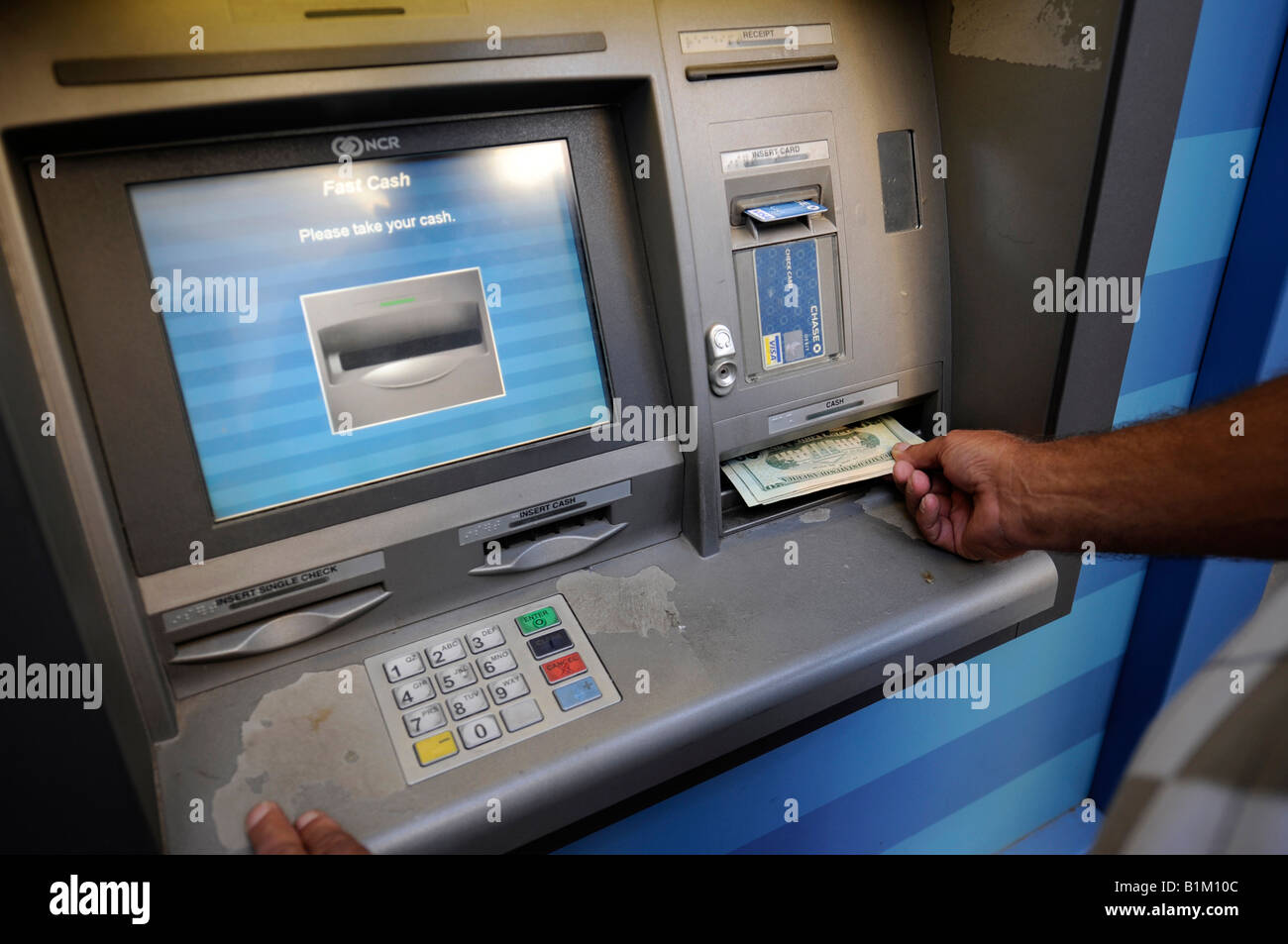 Bank ATM fast cash withdrawl machine system Stock Photo - Alamy