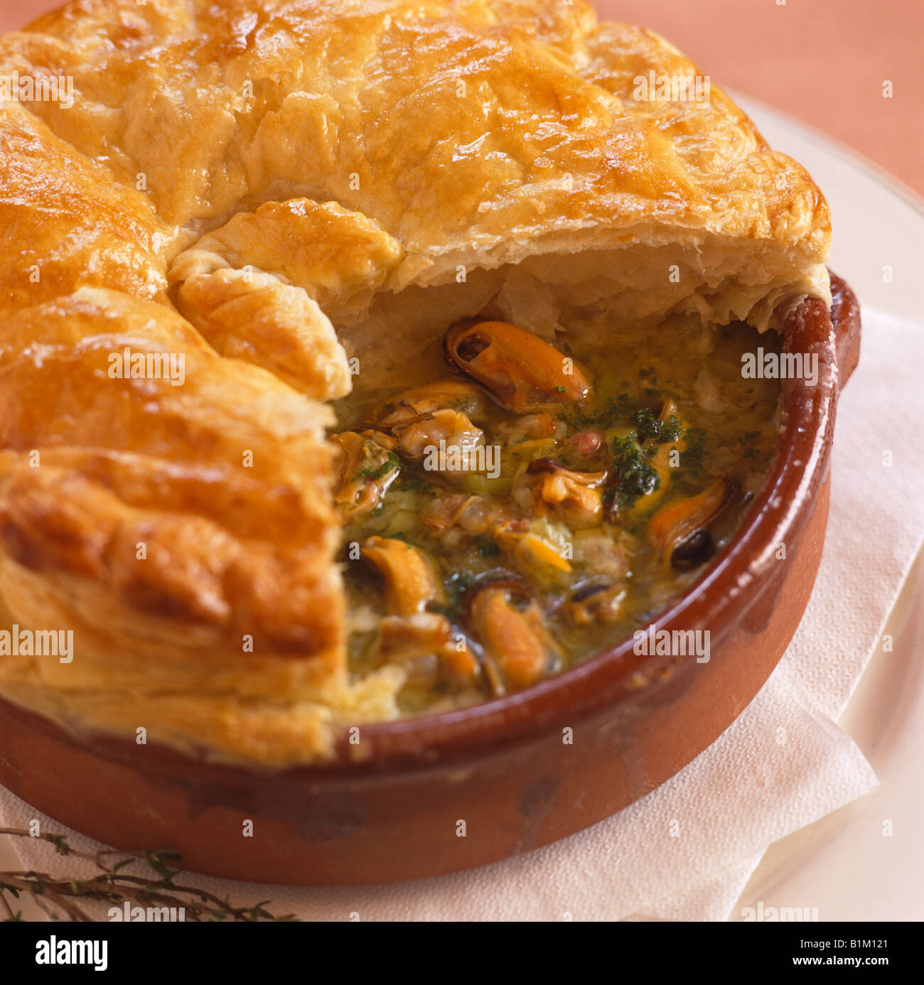 Seafood pie with puff pastry crust Stock Photo - Alamy
