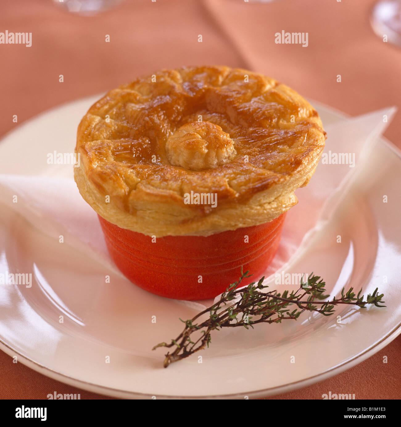 Individual pie with puff pastry crust Stock Photo - Alamy