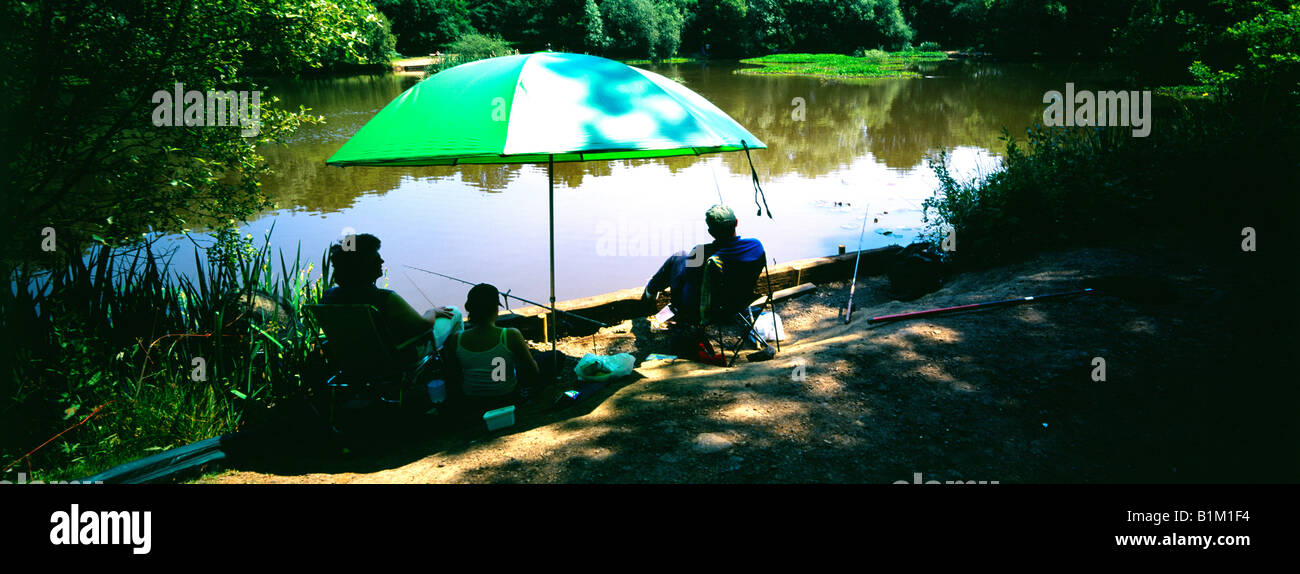 Epsom Surrey Country Park Stew Ponds Men Fishing Green Umbrella Stock ...
