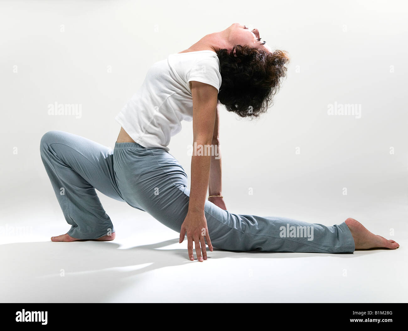 woman practicing the salutation pose Stock Photo - Alamy