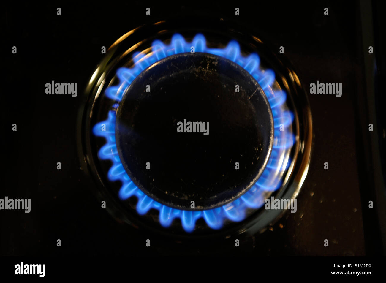 Blue flame stove top kitchen range Stock Photo - Alamy