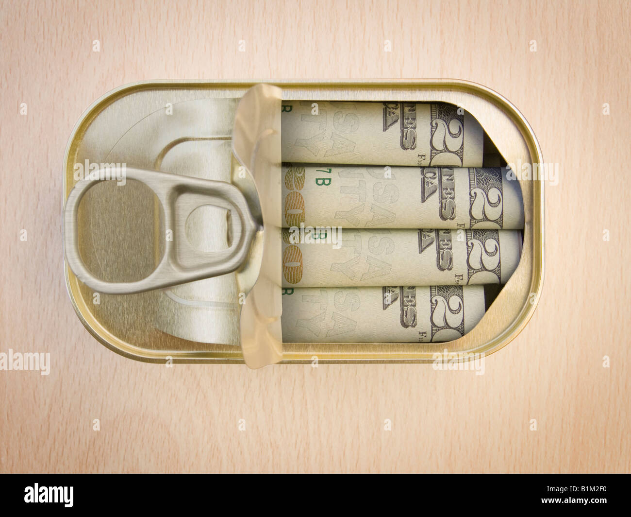 Plan view of a Ring Pull Tin containing rolled 20 Dollar notes on ...