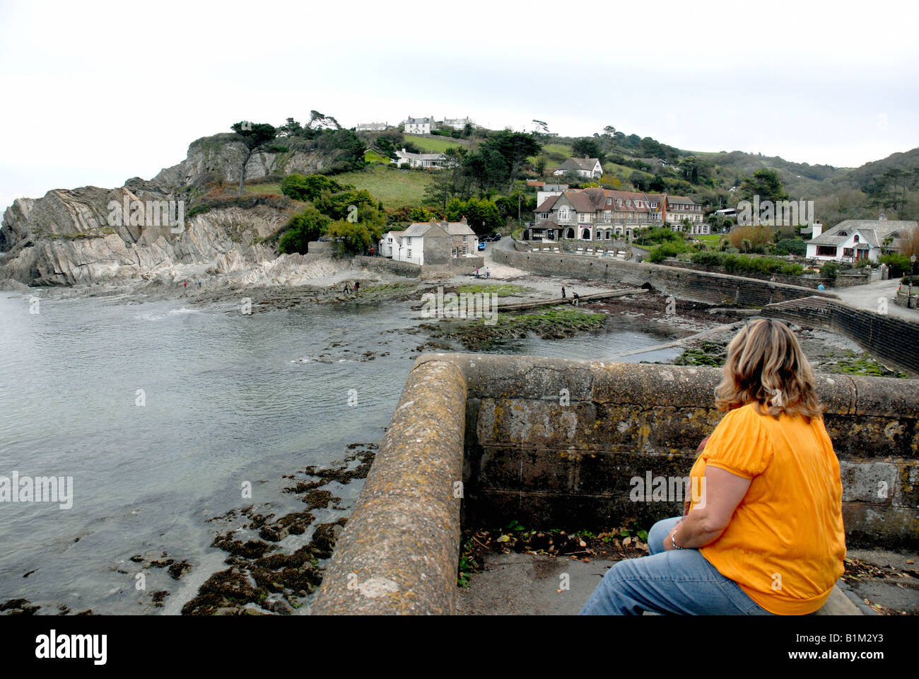 Lee Bay North Devon with female figure in foreground England UK Stock ...