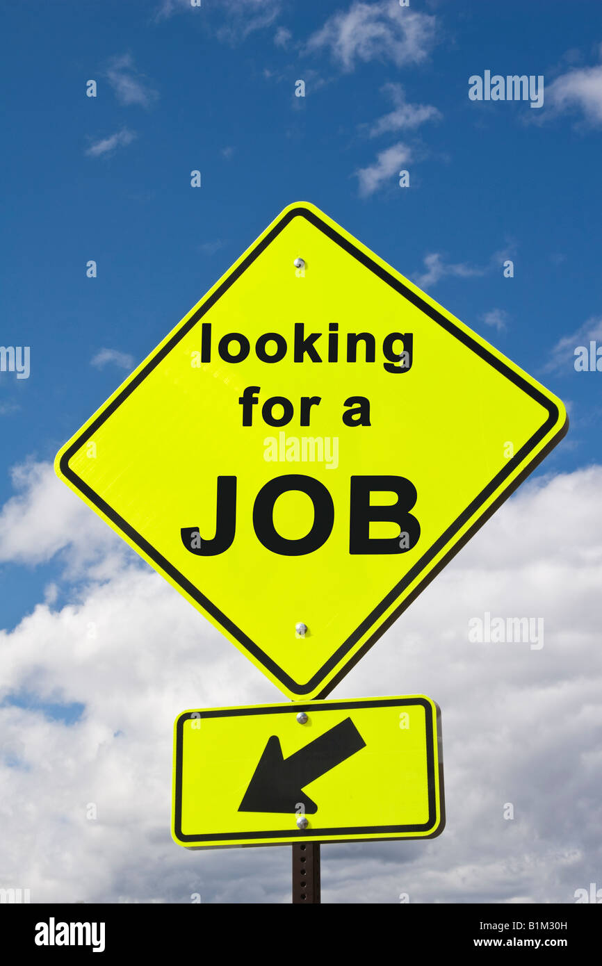 Sign Looking for a Jobon a yellow road sign and blue sky Stock Photo ...