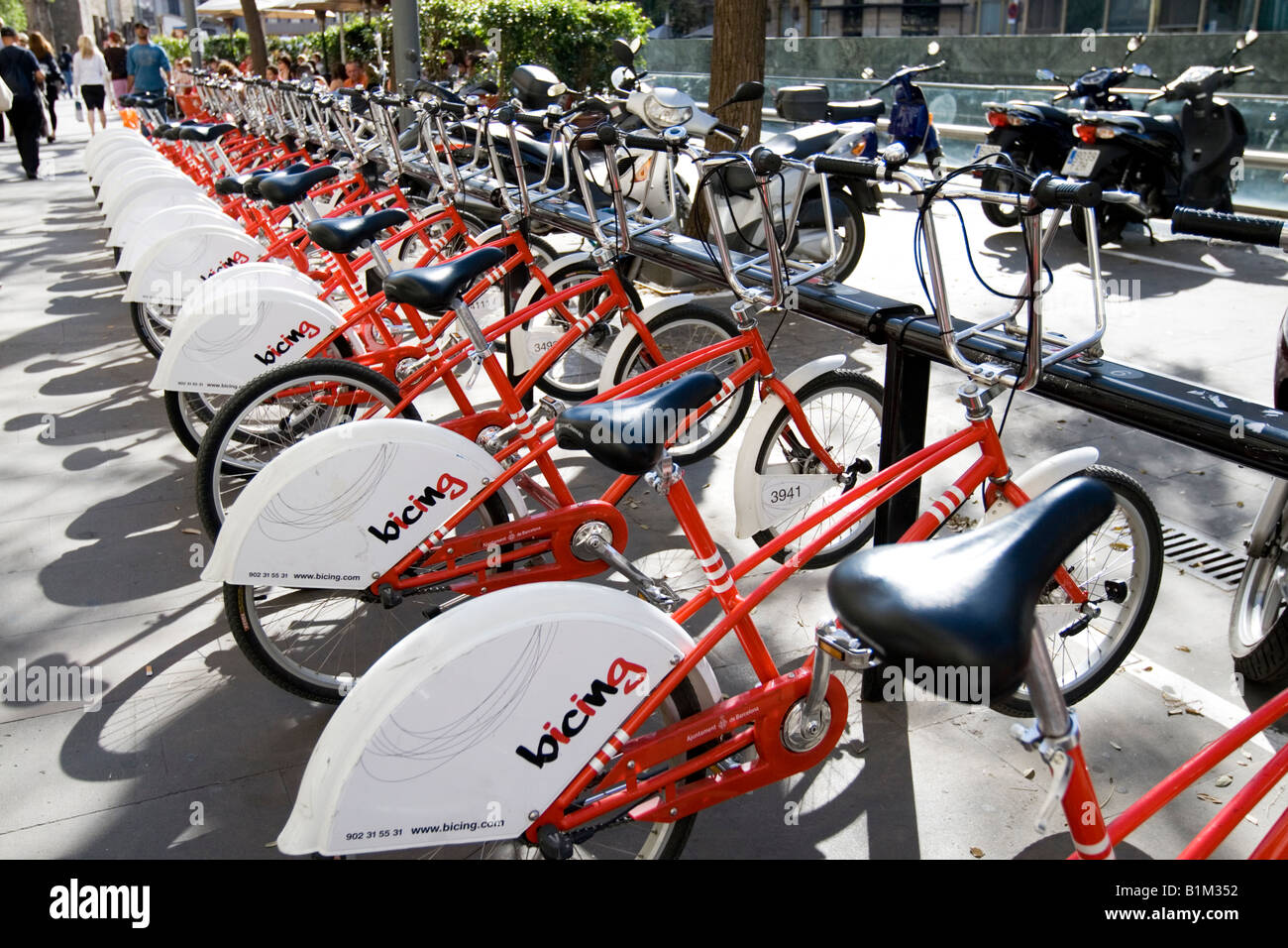 Bikes for rent in the city centre of Barcelona Spain Stock Photo - Alamy