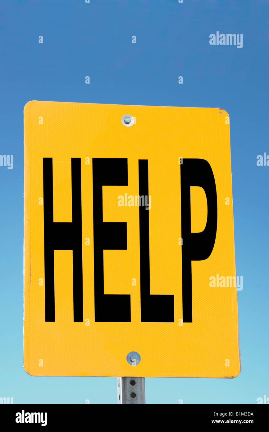 Sign HELP on a yellow road sign and blue sky Stock Photo - Alamy