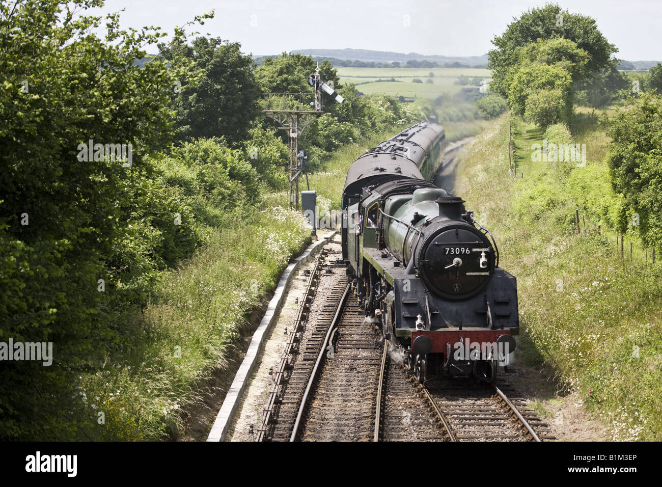 Steam Train carriages semaphor signal and driver Stock Photo - Alamy