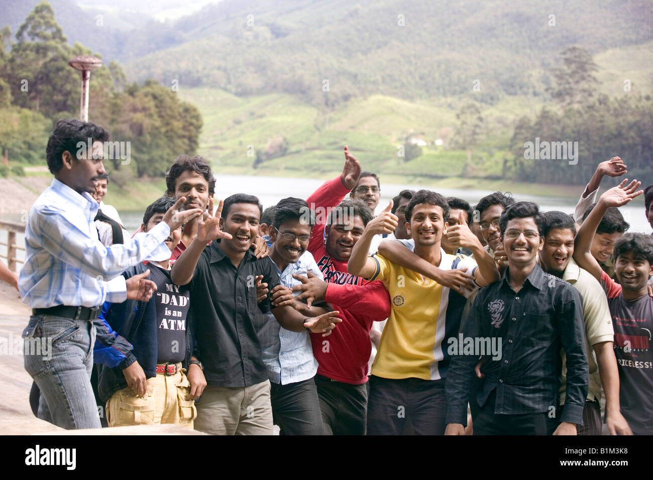 Young Indian men on excursion pose in high spirits for the camera ...