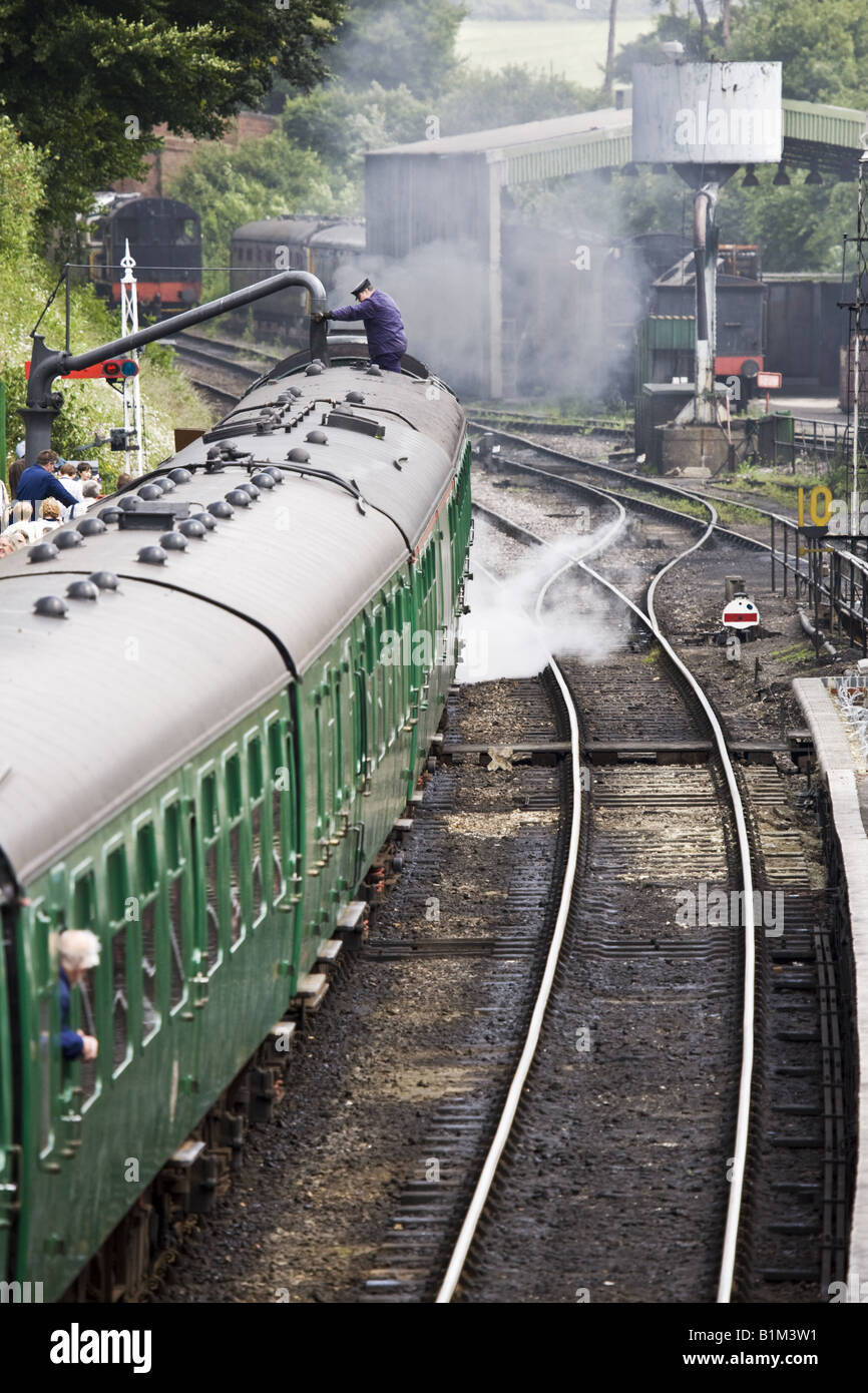 Steam train filling water hi-res stock photography and images - Alamy