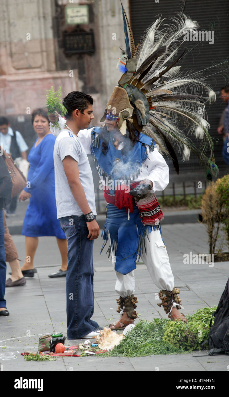 Aztec performing spiritual cleansing ritual hi-res stock photography ...