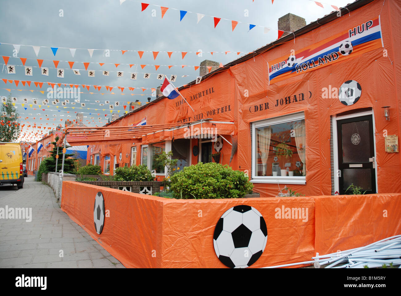 Dutch football supporter street Stock Photo - Alamy