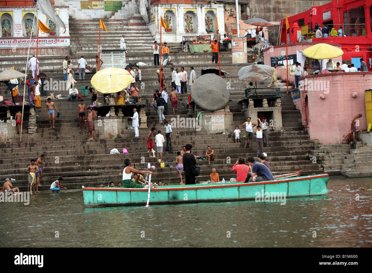 Early morning ablutions on the banks of the Ganges at Varanasi Uttar ...