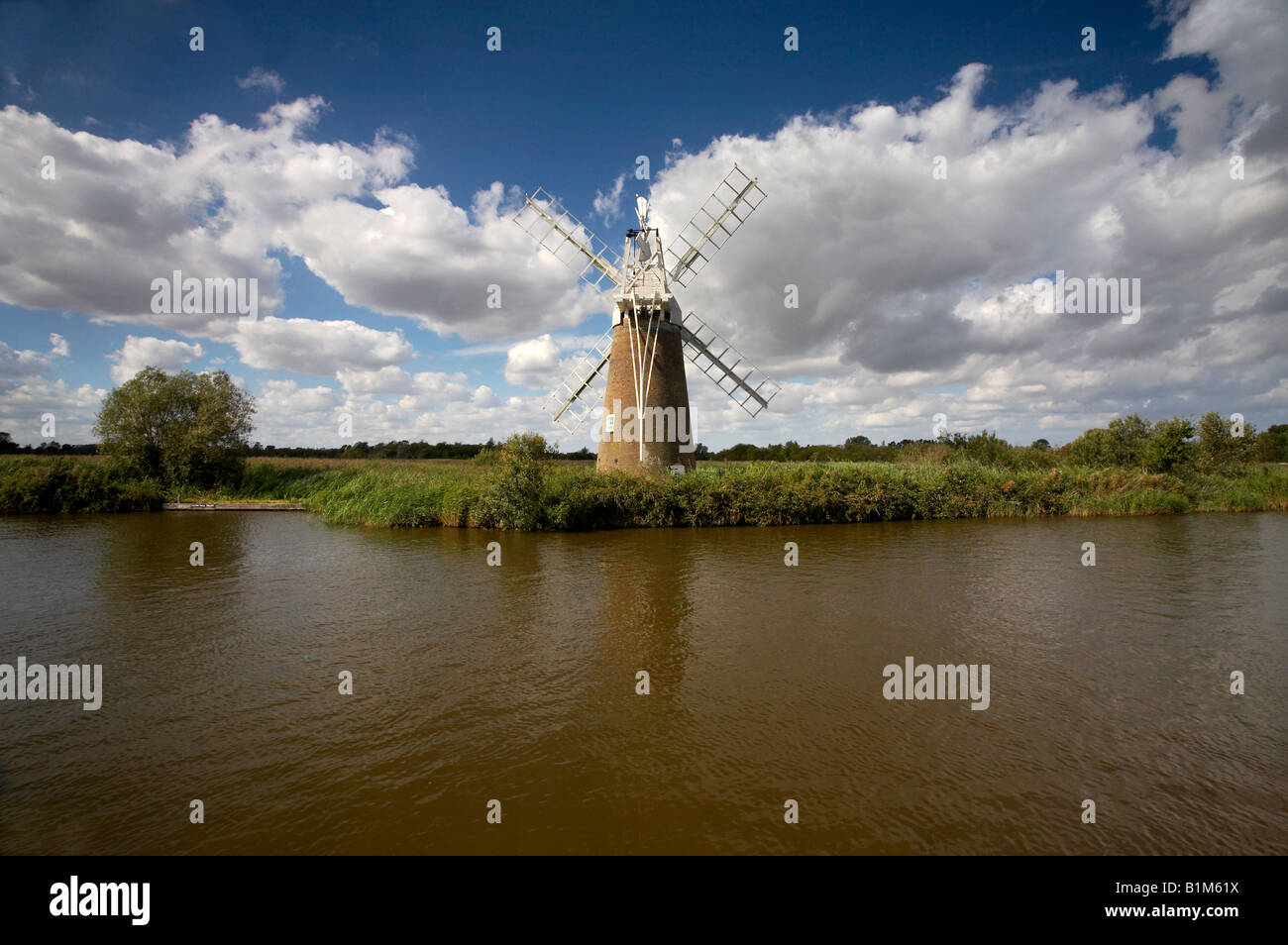 Turf Fen windmill alongside the River Ant Norfolk Broads Stock Photo ...
