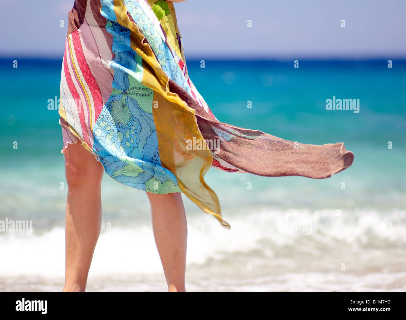 Coloured sun-frock blowing in the wind Stock Photo - Alamy