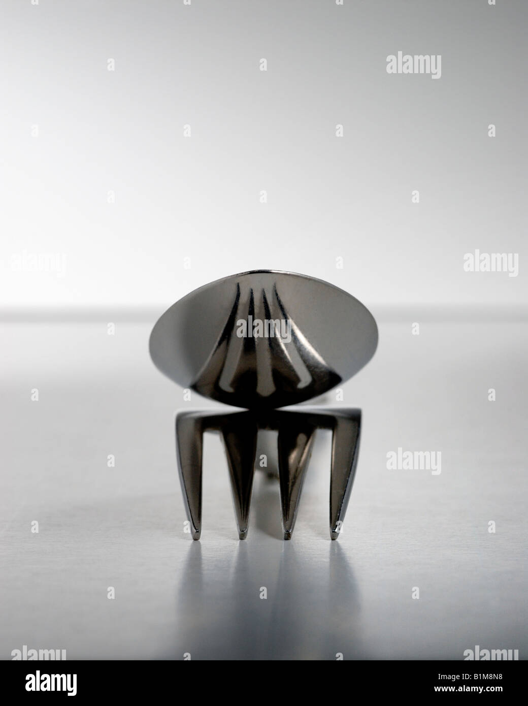 Abstract of a spoon and fork Stock Photo - Alamy
