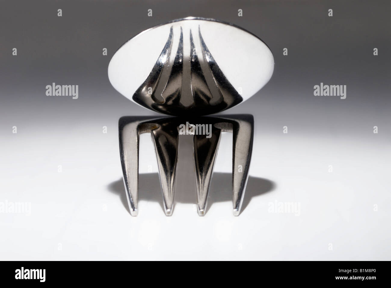 Abstract of a spoon and fork Stock Photo - Alamy