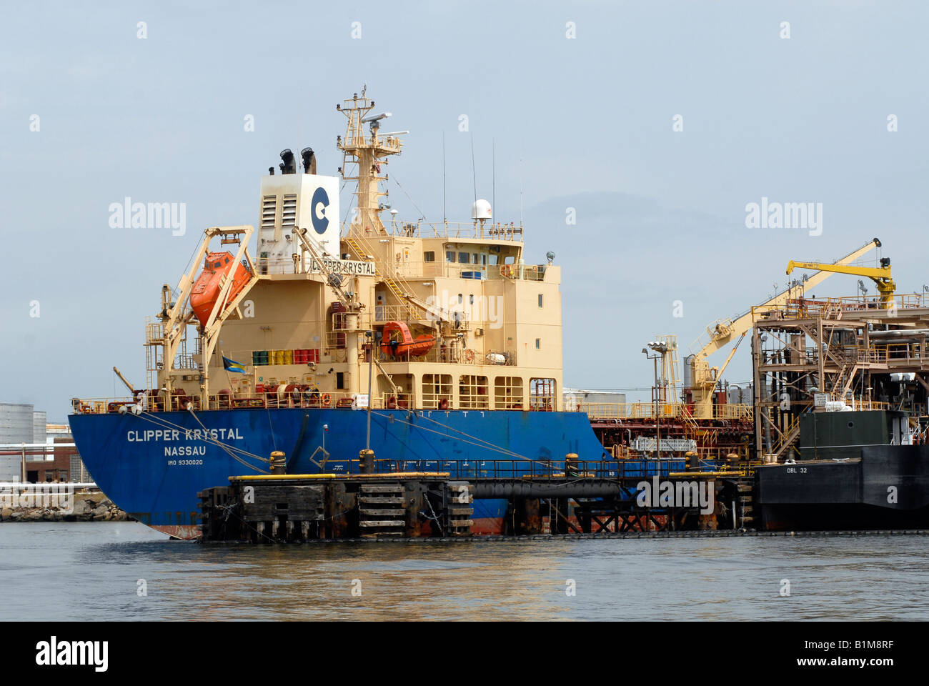 The Clipper Krystal a chemical transport ship at Port Exxon Stock Photo ...