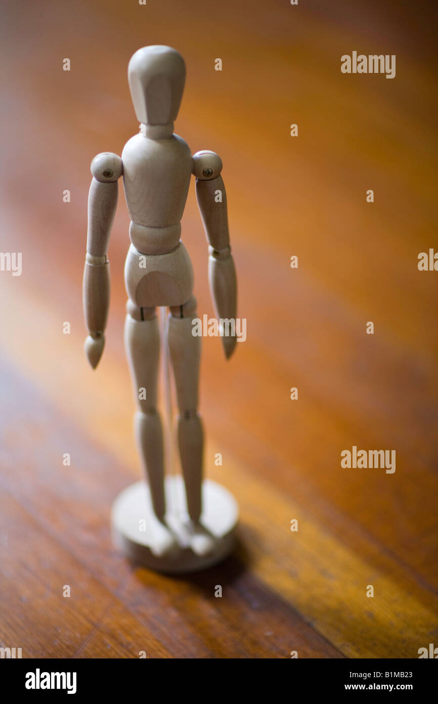A Drawing Figurine on Wood Floor Stock Photo - Alamy