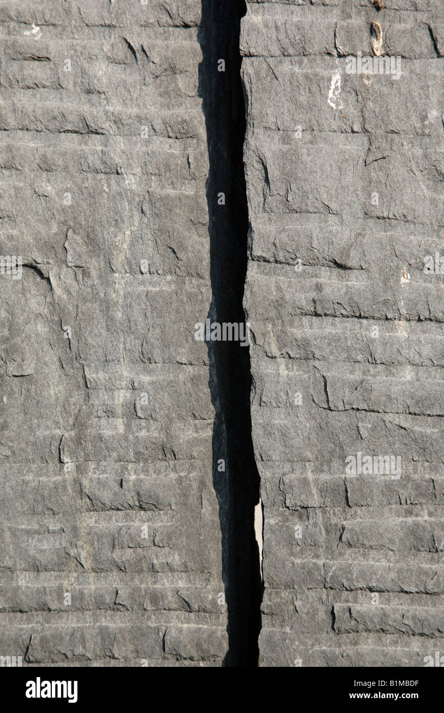 Cracked headstone in a New England graveyard Stock Photo - Alamy
