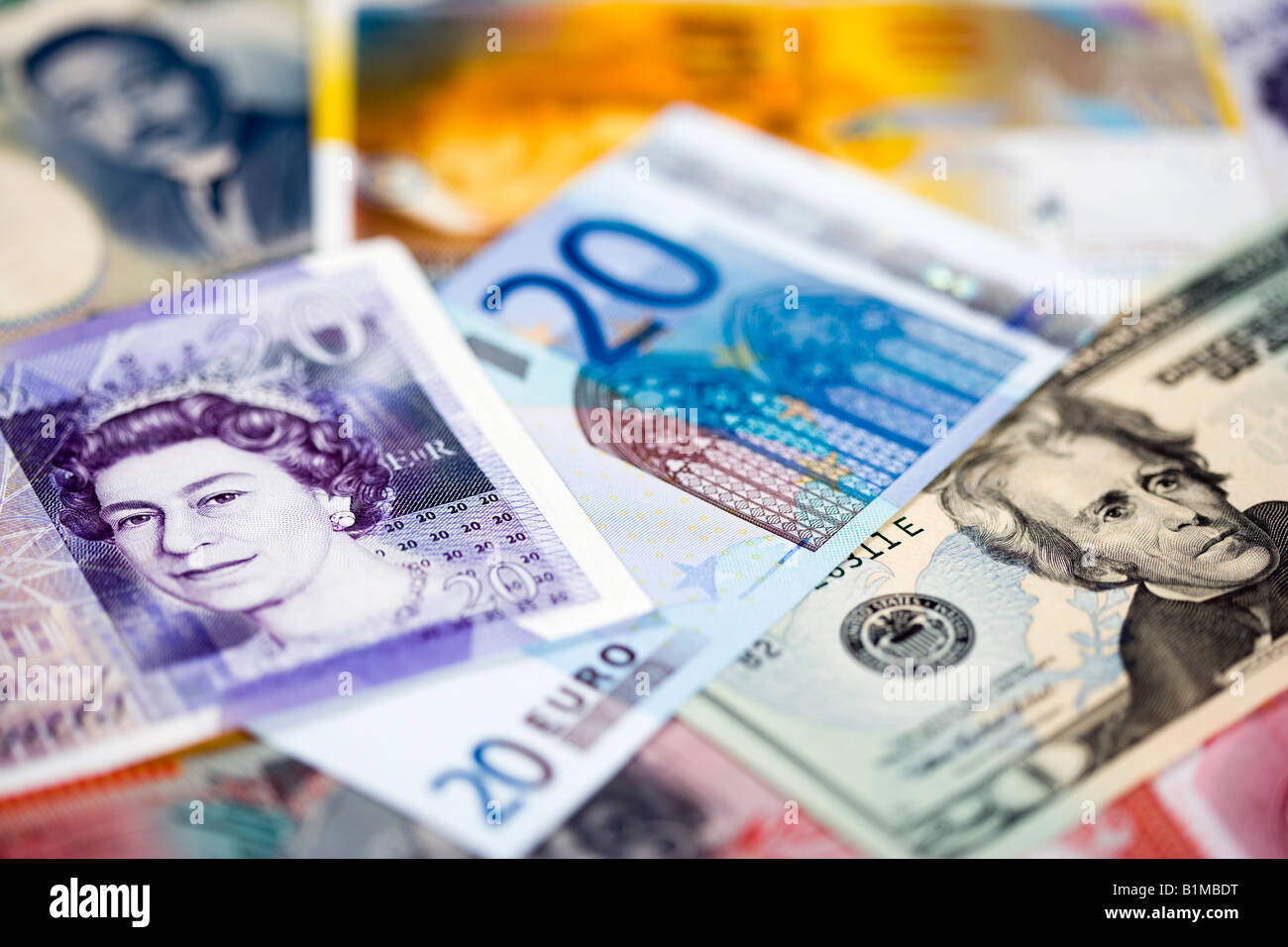 Montage of international currency; Stirling, USD and Euro prominent ...