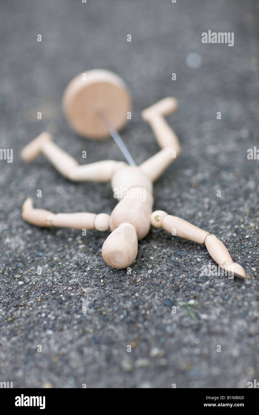 A Fallen Drawing Figurine in the Street Stock Photo - Alamy