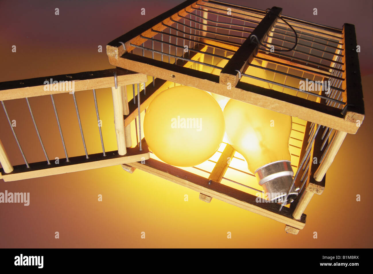Light Bulbs in Wooden Cage Stock Photo - Alamy