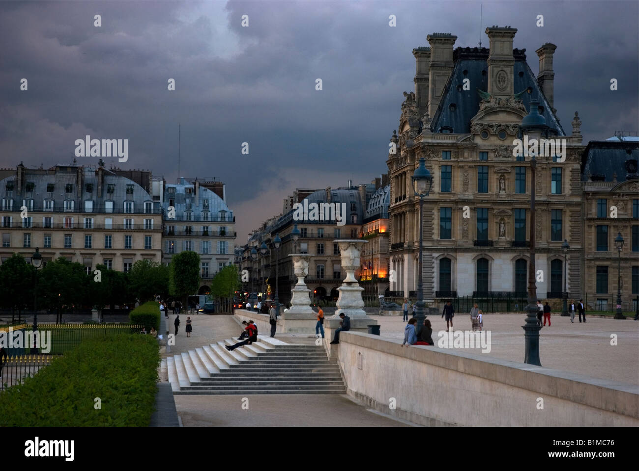 Square in front of Louvre museum at dusk Paris France Stock Photo - Alamy